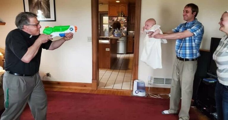 Super Soaker wielding Priest just baptized the shit out of this kid ...